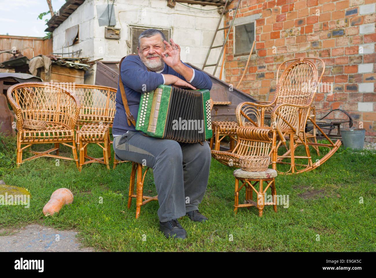 Positive Ukrainian country-man having a short rest after hard work ...