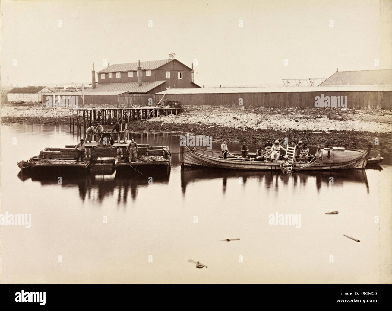 This photograph, taken between 1880 and 1890, depicts divers descending ...