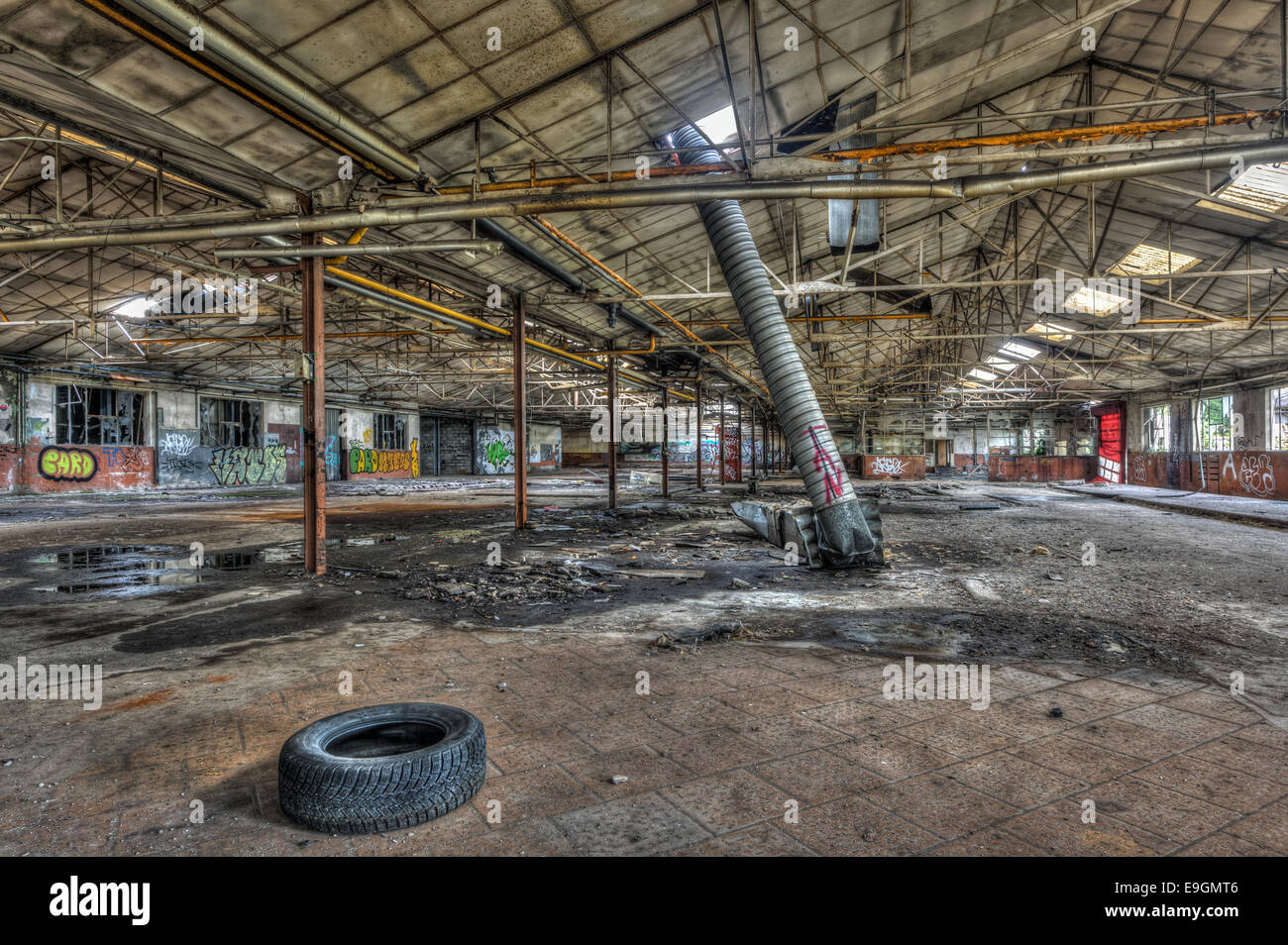 Dilapidated warehouse in an abandoned factory Stock Photo - Alamy