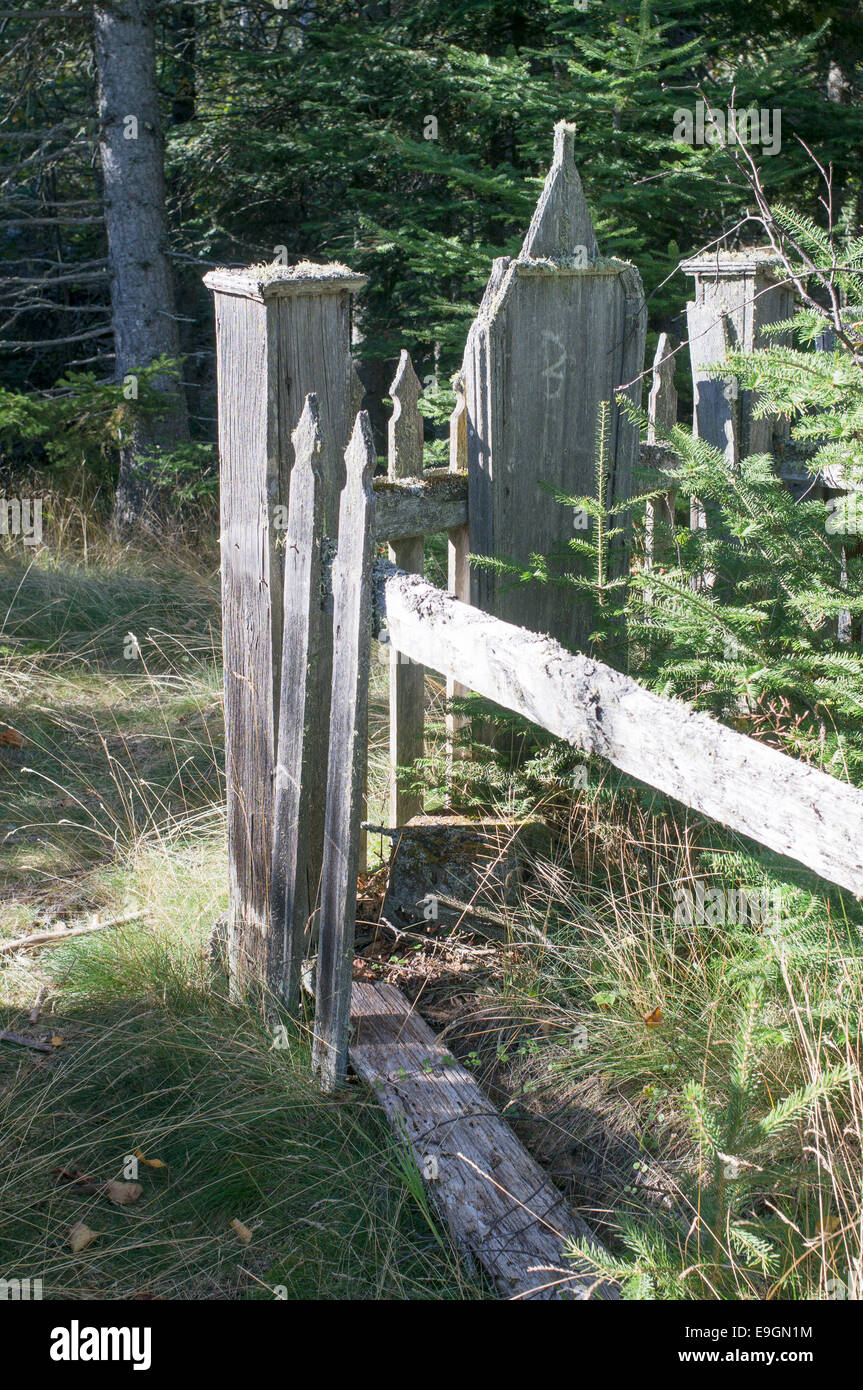 Old fenced grave with wooden headboard or headstone Silver Islet ...