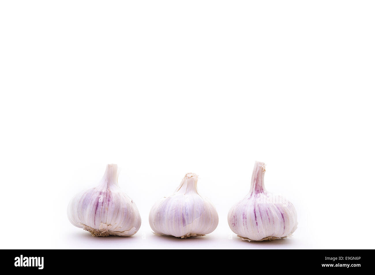 3 cloves of garlic Stock Photo - Alamy
