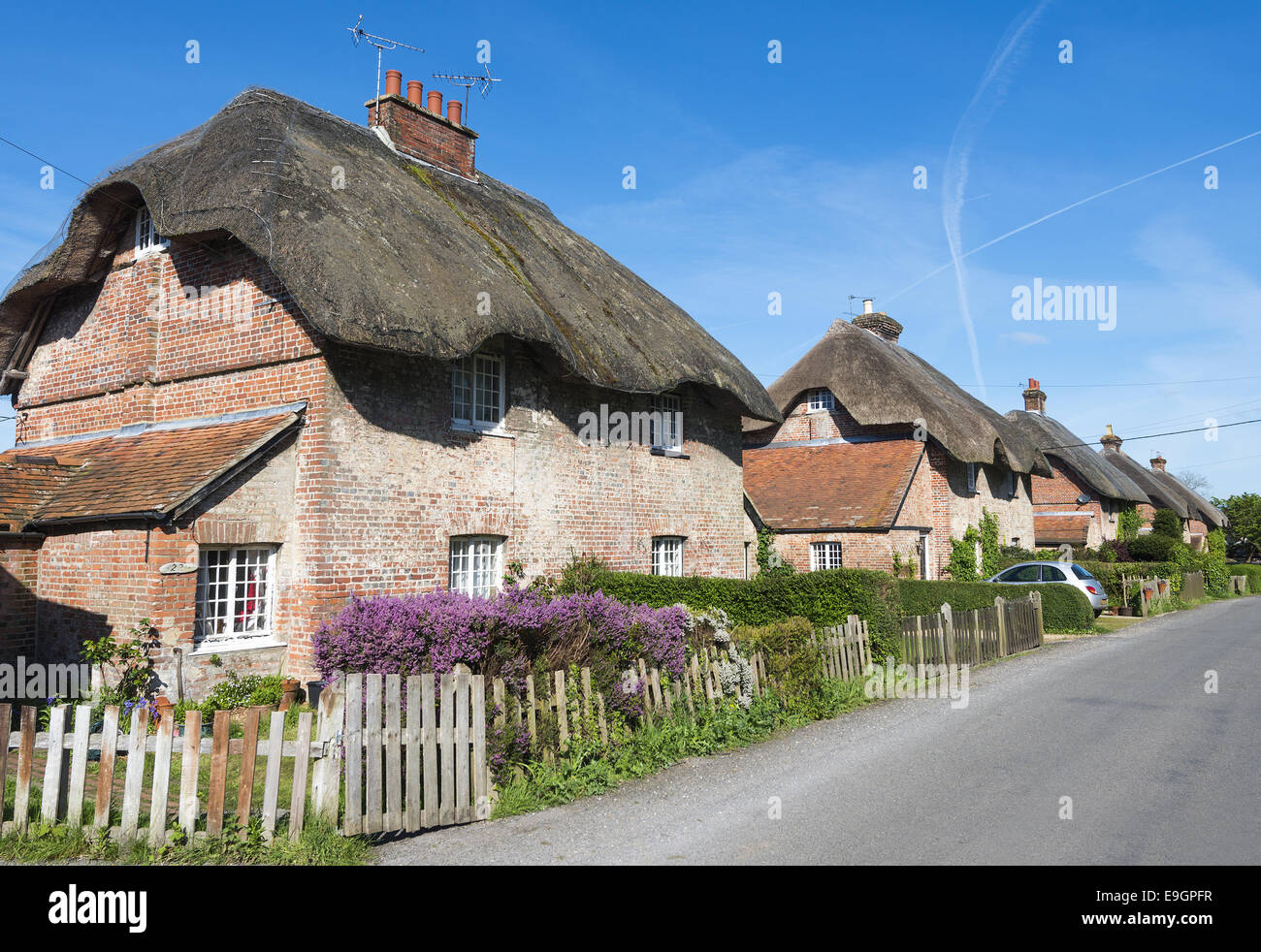 Row of thatched cottages in the small village of East Stratton near ...