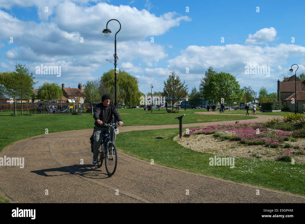 Man ride cycle in park hi-res stock photography and images - Alamy