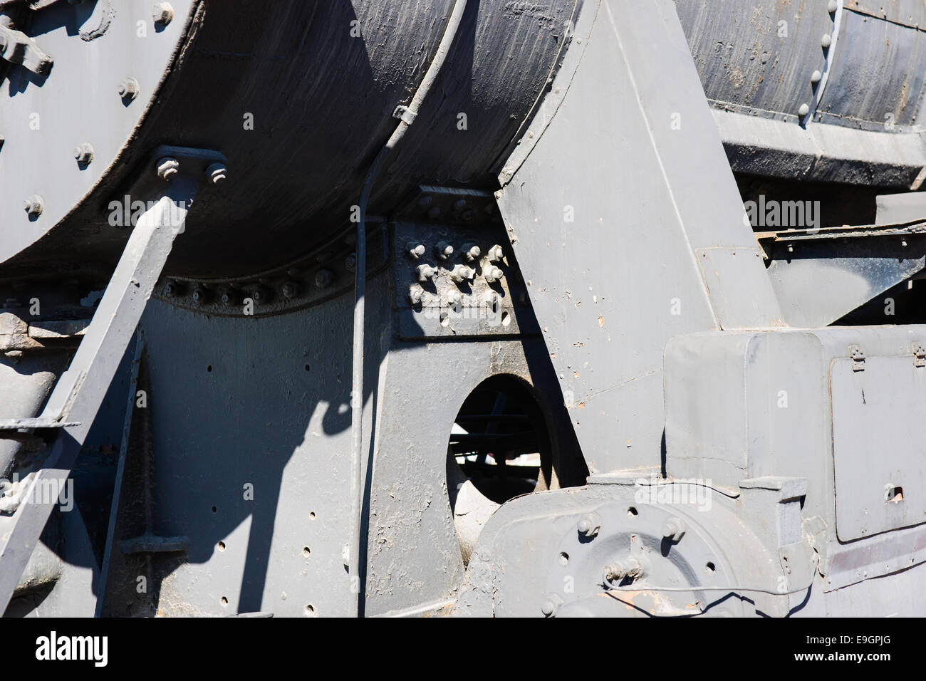 Metal frames and structures around a steam locomotive boiler painted in ...