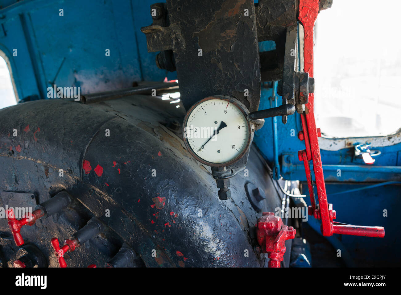 Interior of a cabin, cab of an old steam locomotive. Boiler, locomotive ...