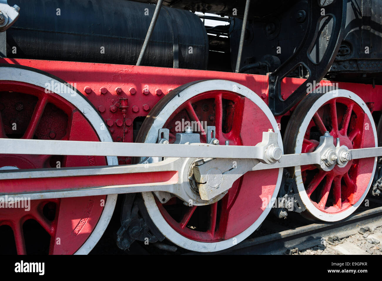 Closeup view of steam locomotive wheels, drives, rods, links and other ...