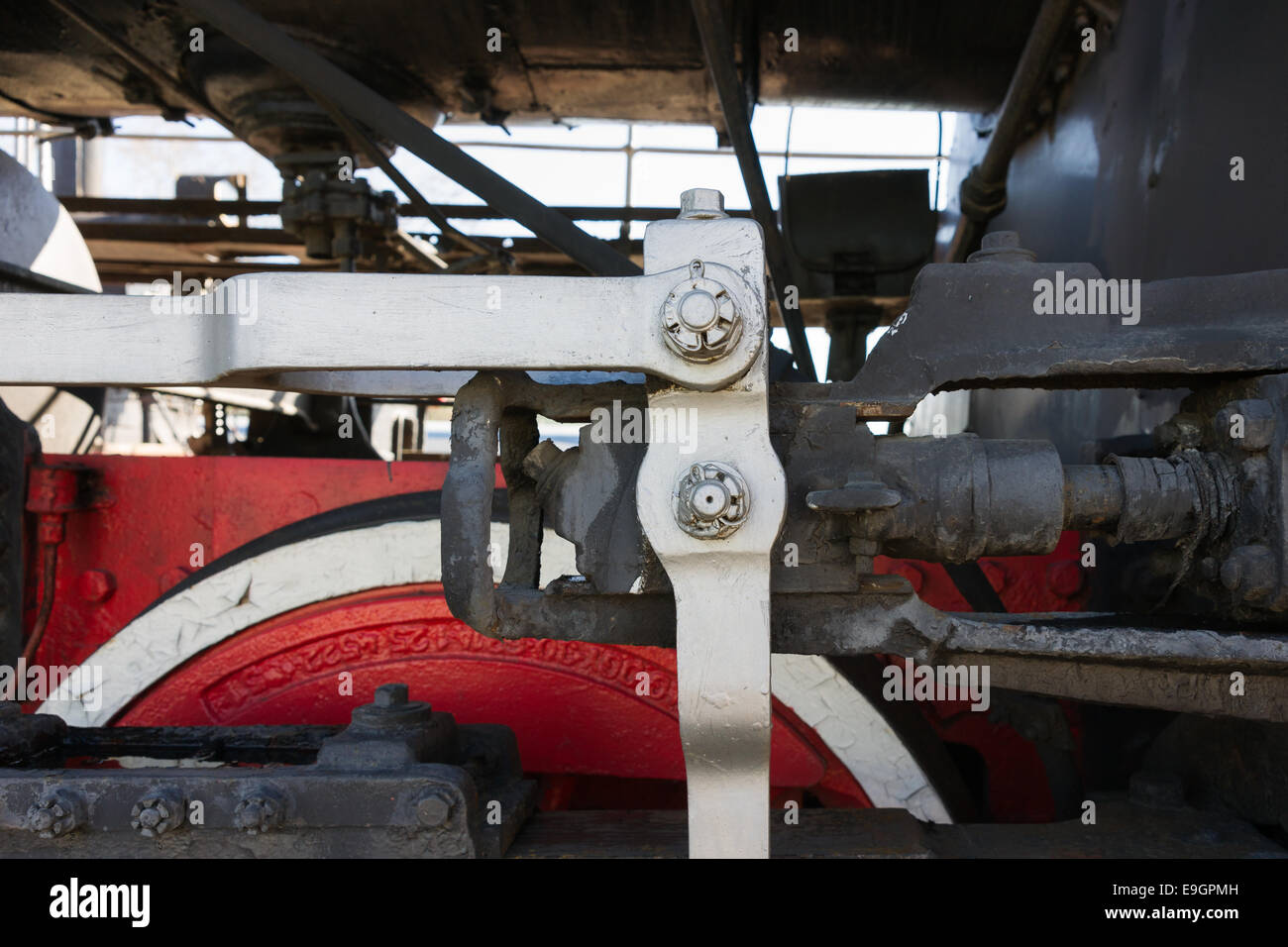 Closeup view of steam locomotive wheels, drives, rods, links and other ...