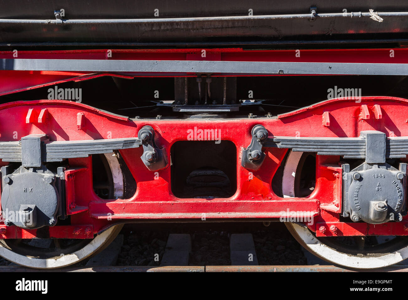 Closeup view of an old railway car wheels, leaf springs, journal boxes ...