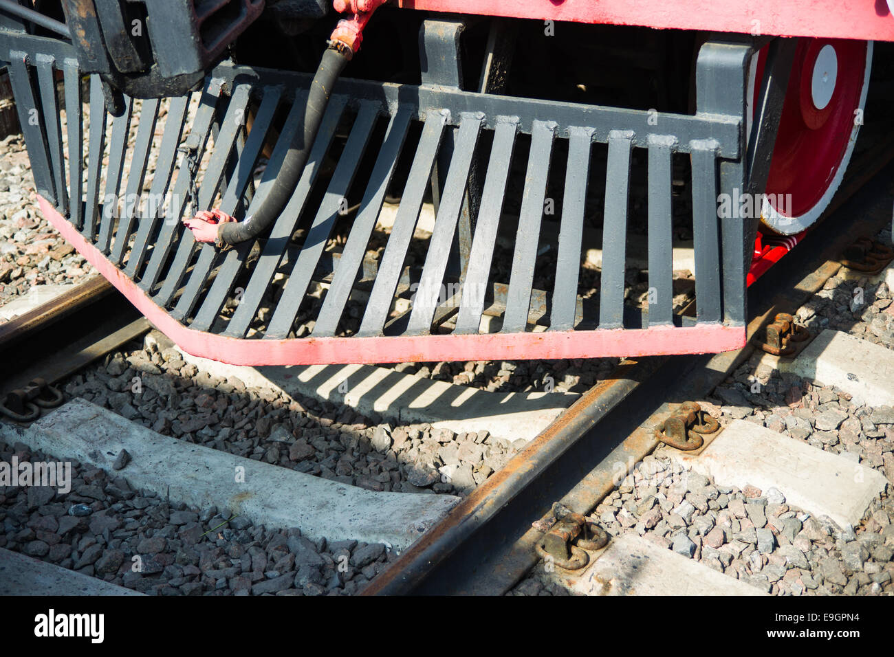 Closeup view of the rail cleaner, pilot or cow catcher of an old ...