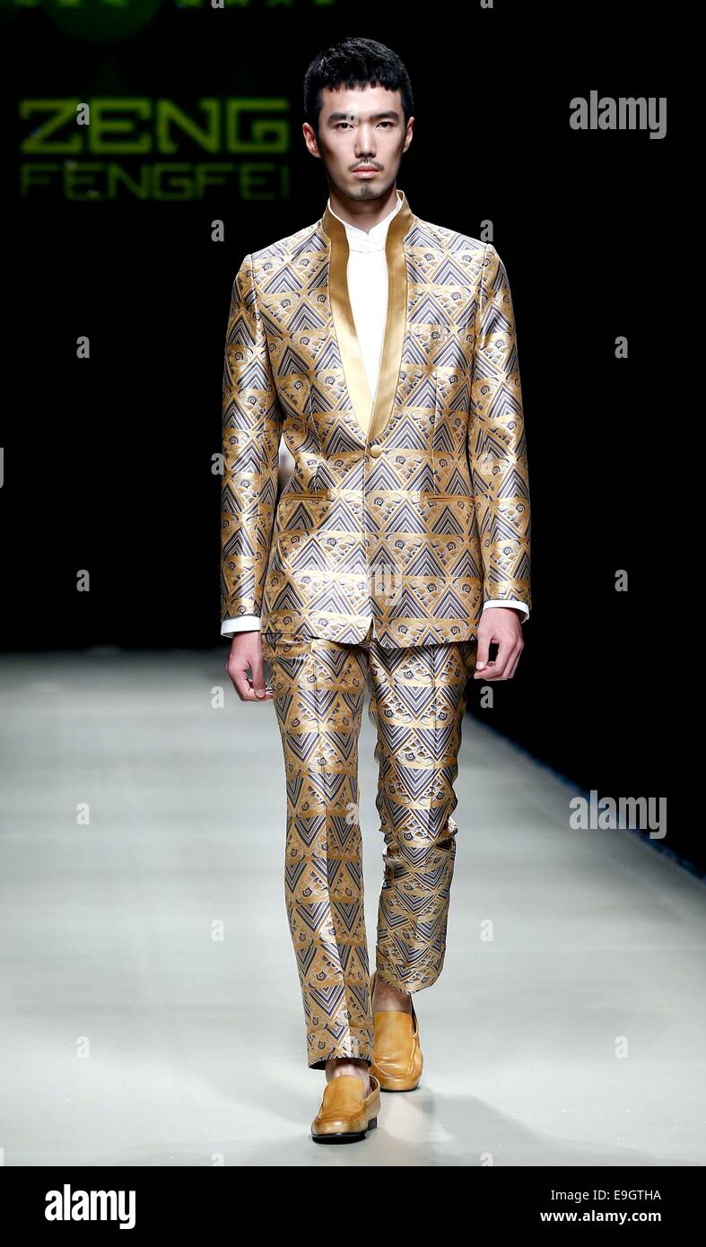 Beijing, China. 27th Oct, 2014. A model presents a creation during the ...