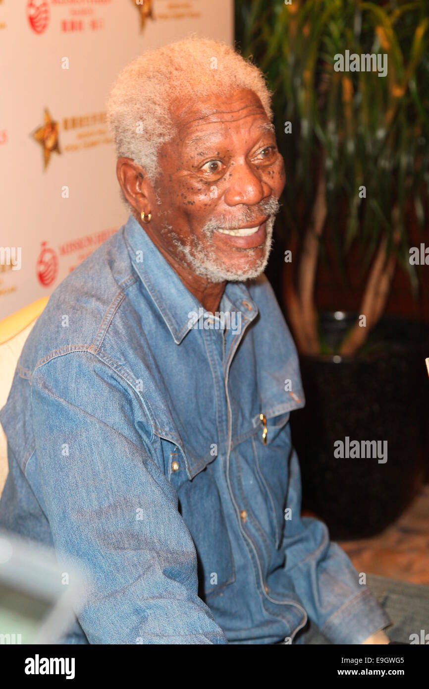 Morgan Freeman attends a press conference after watching a golf game in ...