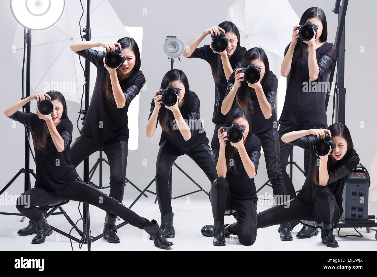 Multiple images of photographer taking picture in studio Stock Photo ...