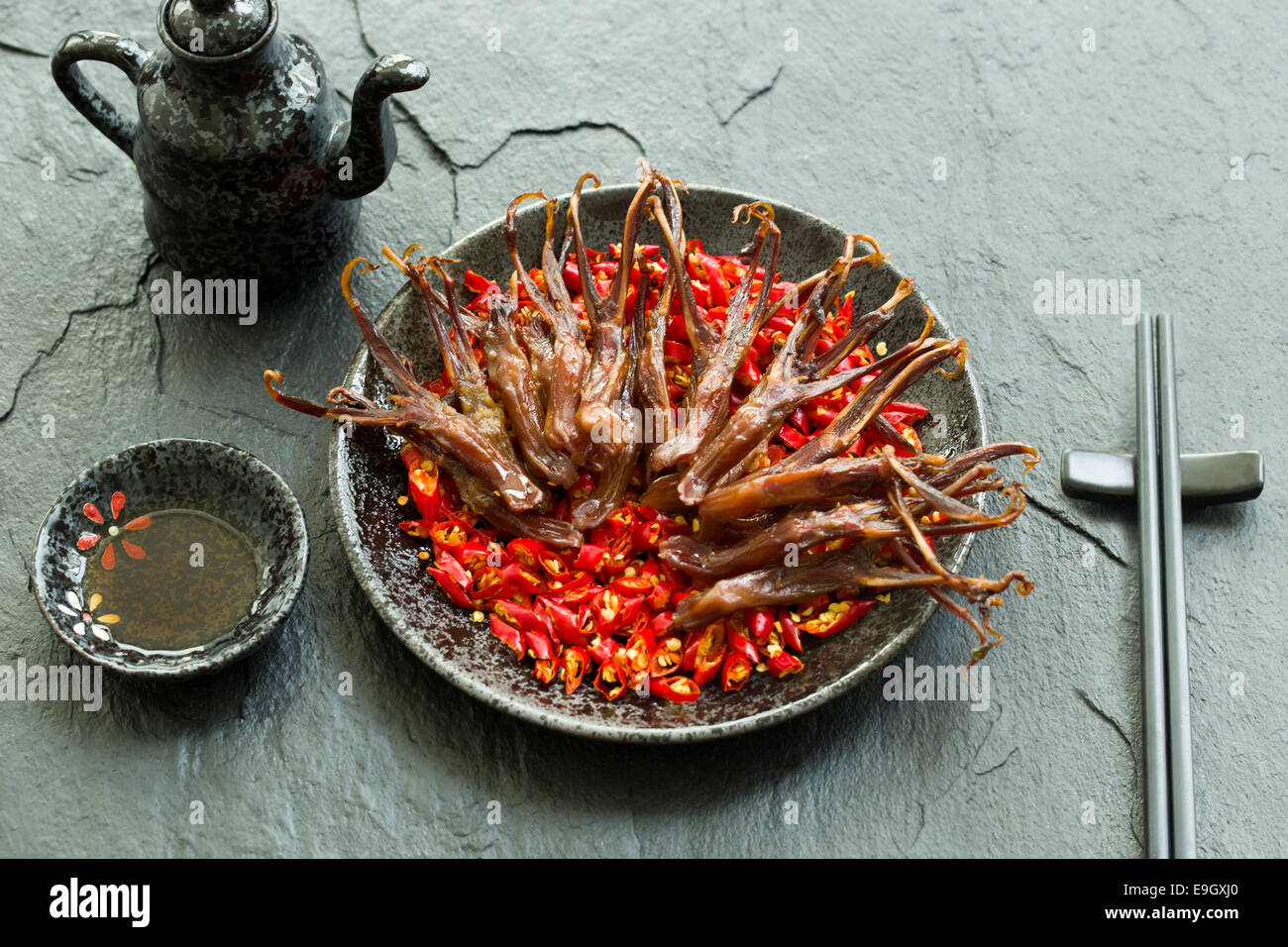 Chinese cuisine braised duck tongues Stock Photo - Alamy