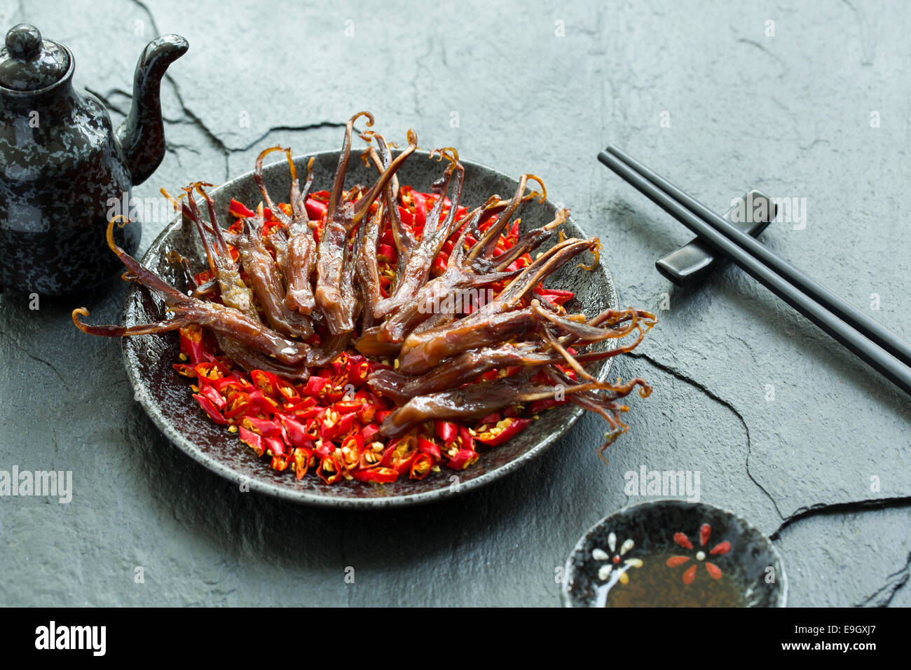 Chinese cuisine braised duck tongues Stock Photo - Alamy