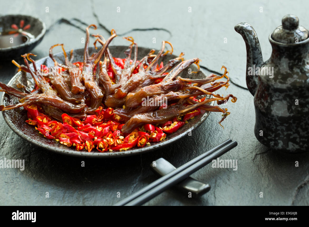 Chinese cuisine braised duck tongues Stock Photo - Alamy