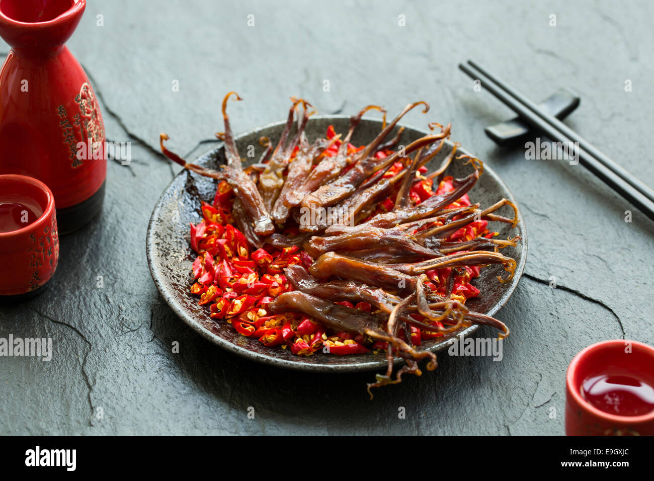 Chinese cuisine braised duck tongues Stock Photo - Alamy