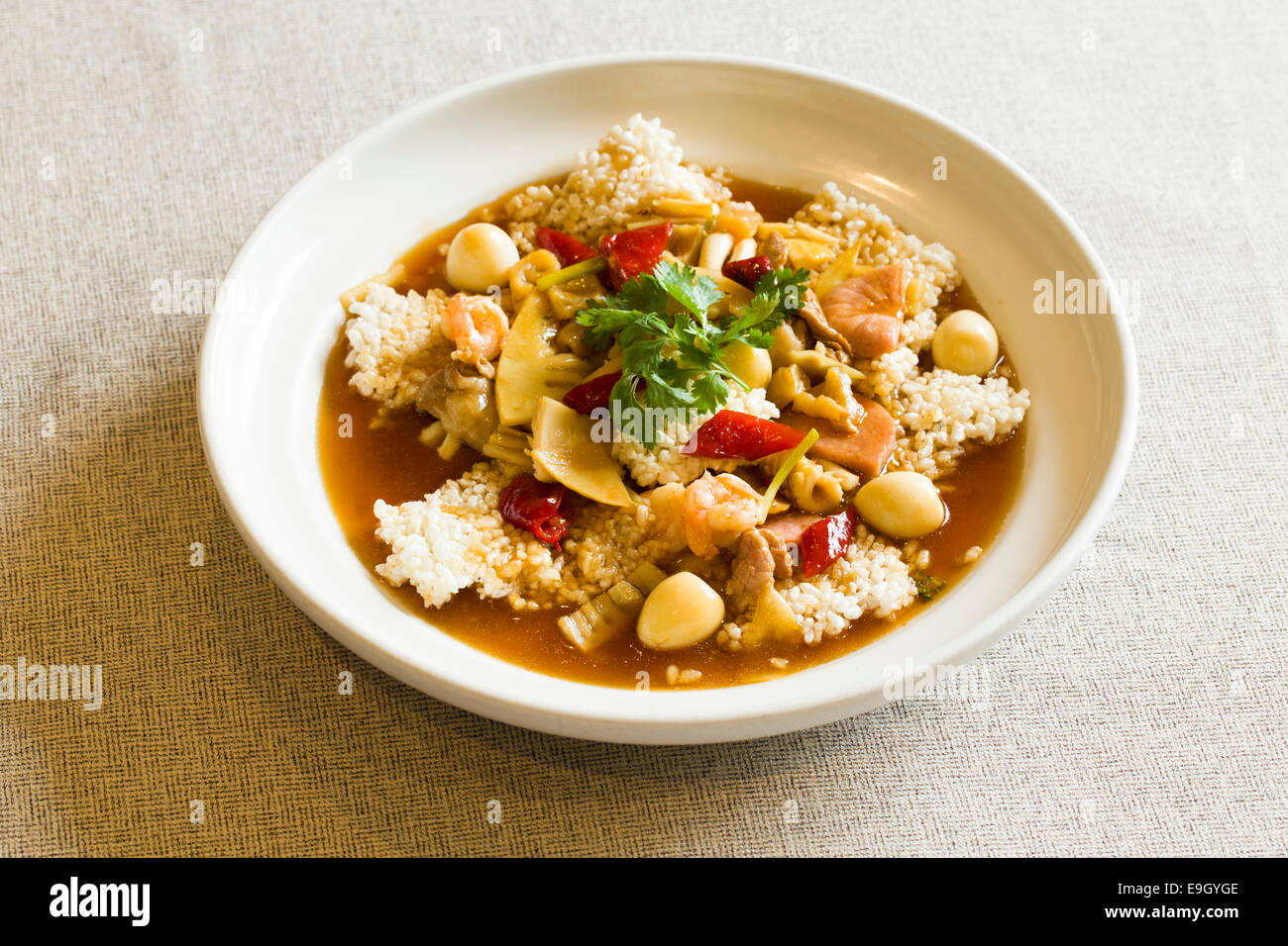 Chinese cuisine spicy crispy rice Stock Photo - Alamy