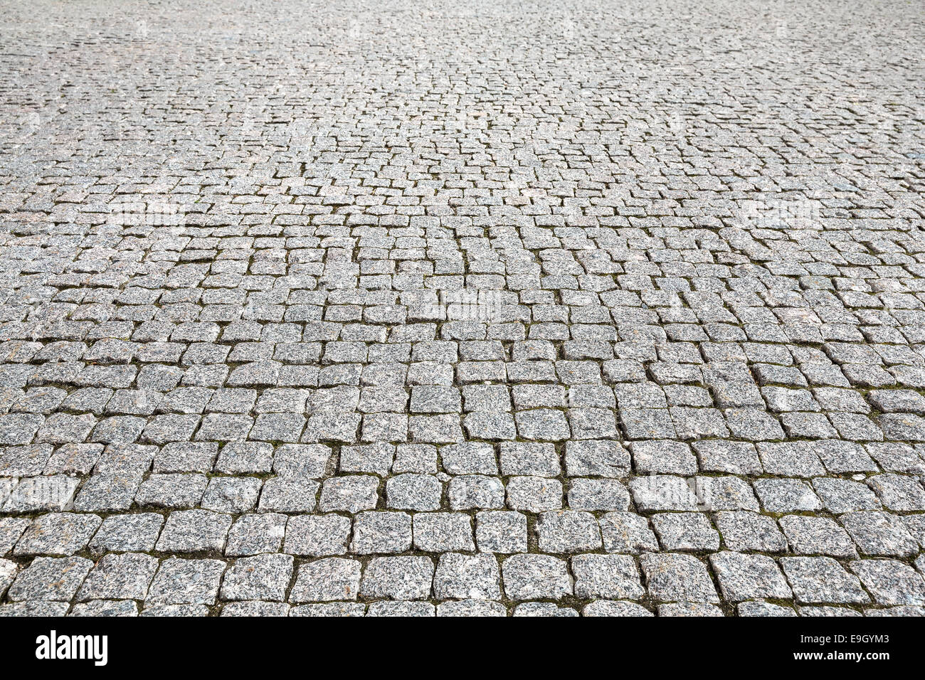 Vintage stone street road pavement texture Stock Photo - Alamy