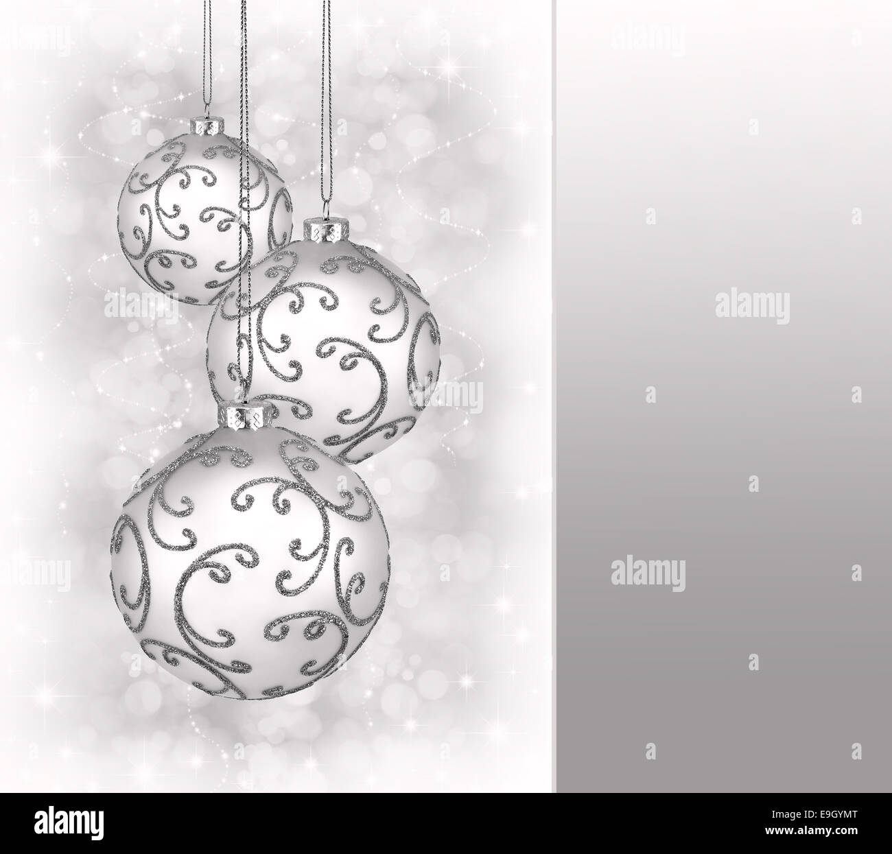 Three beautiful christmas balls on a silver background Stock Photo - Alamy