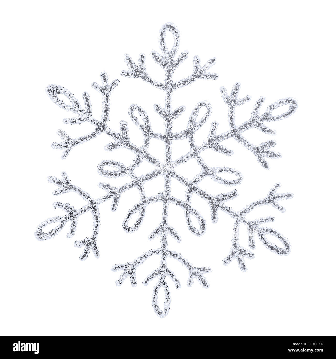 Silver shiny snowflake isolated on a white background Stock Photo - Alamy