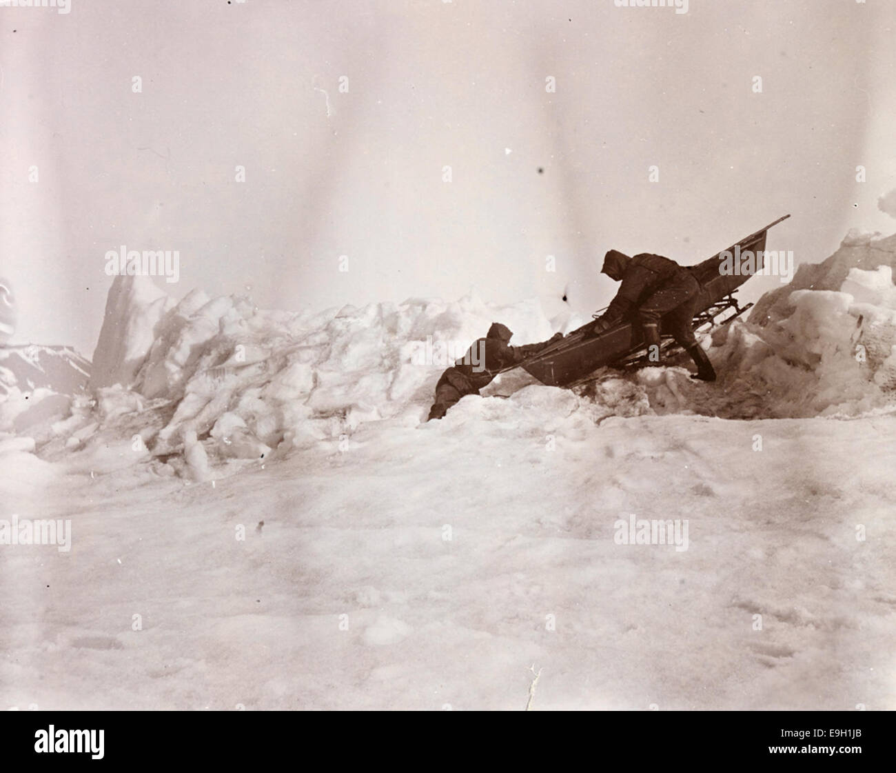 Fridtjof Nansen and Fredrik Hjalmar Johansen are shown pulling a sled ...