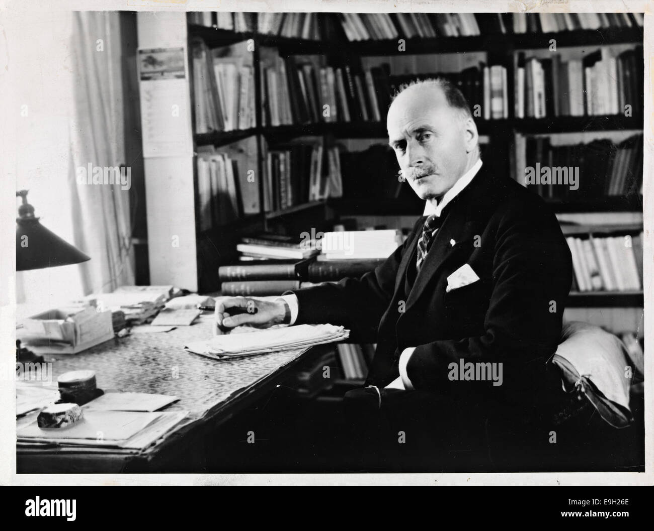 Knut Hamsun, the famous Norwegian author, is shown in his writing cabin ...