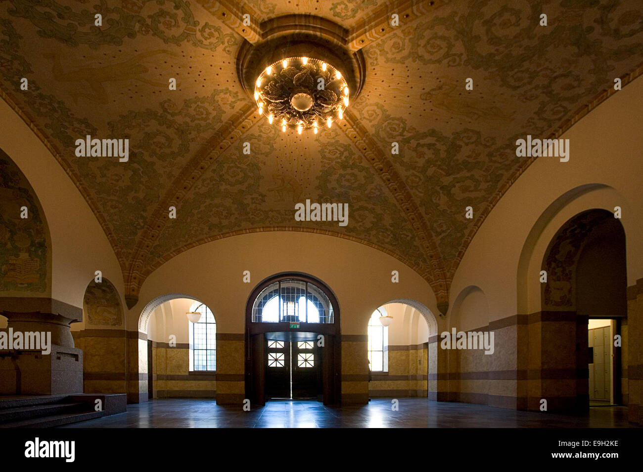 A photograph of a building interior, showing detailed architectural ...