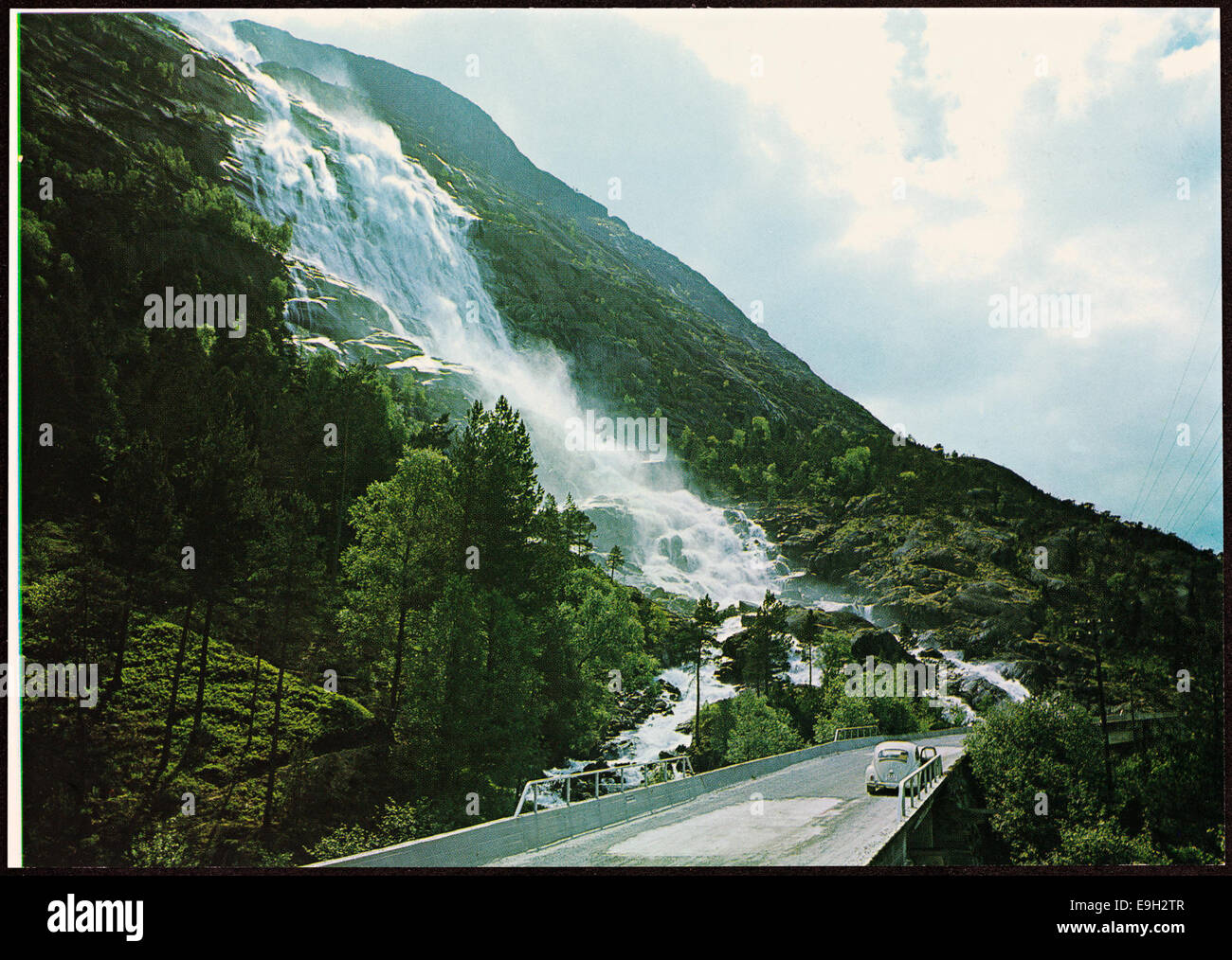 A historical postcard depicting Langfoss waterfall in Hordaland, Norway ...