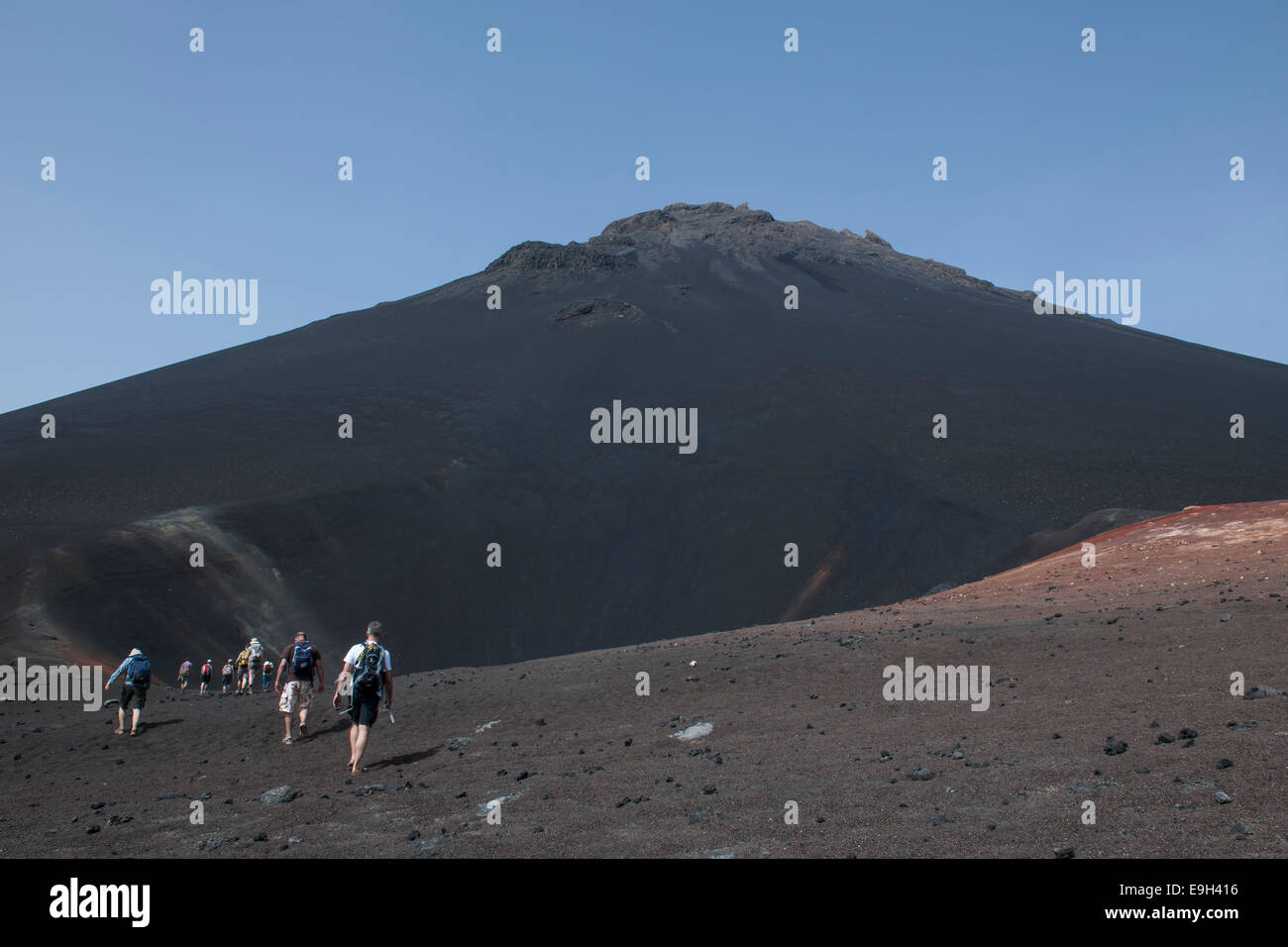 Hikers in the volcanic landscapes of the volcano Pico do Fogo, Fogo ...