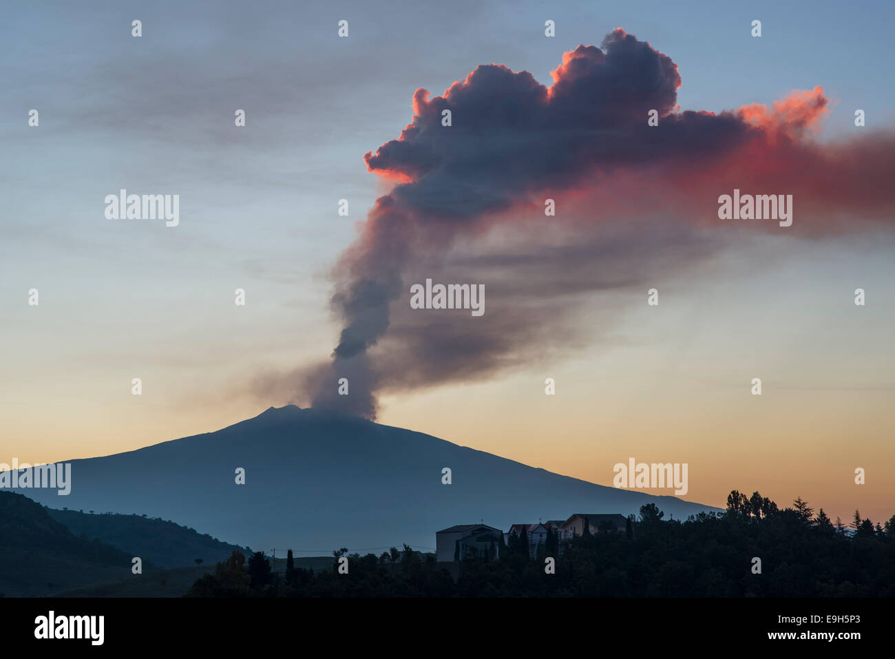 Eruption column above the new southeast crater at sunrise, Mount Etna ...