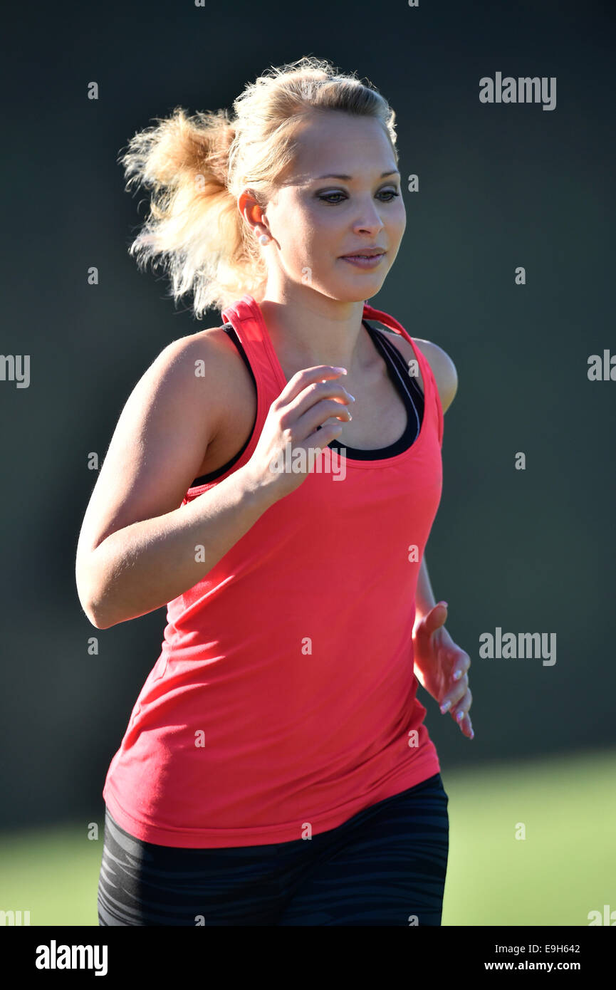 Young woman jogging, Germany Stock Photo - Alamy