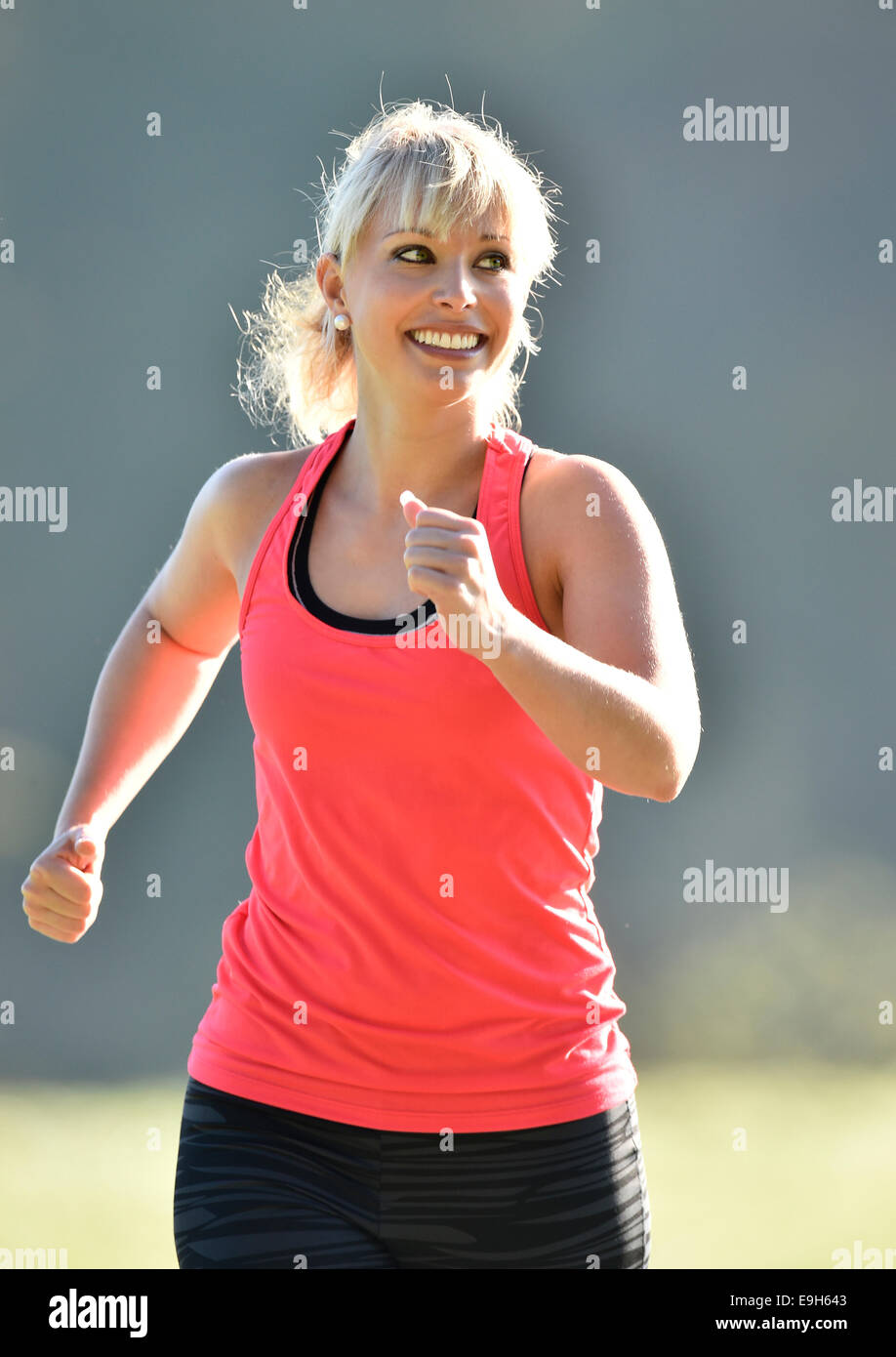 Young woman jogging, Germany Stock Photo - Alamy