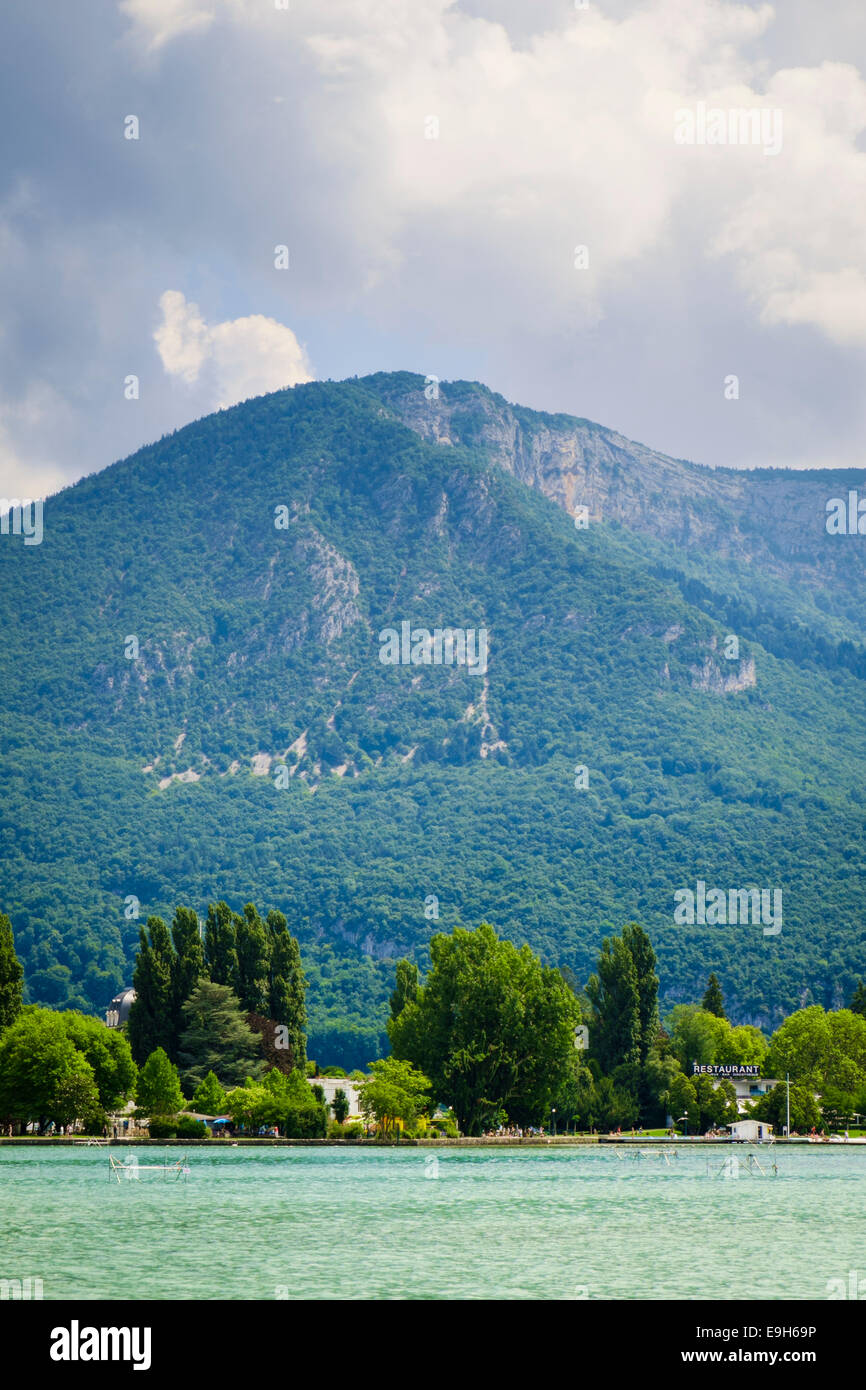 Lake Annecy, Haute-Savoie, France, and Mont Baron mountain Stock Photo ...