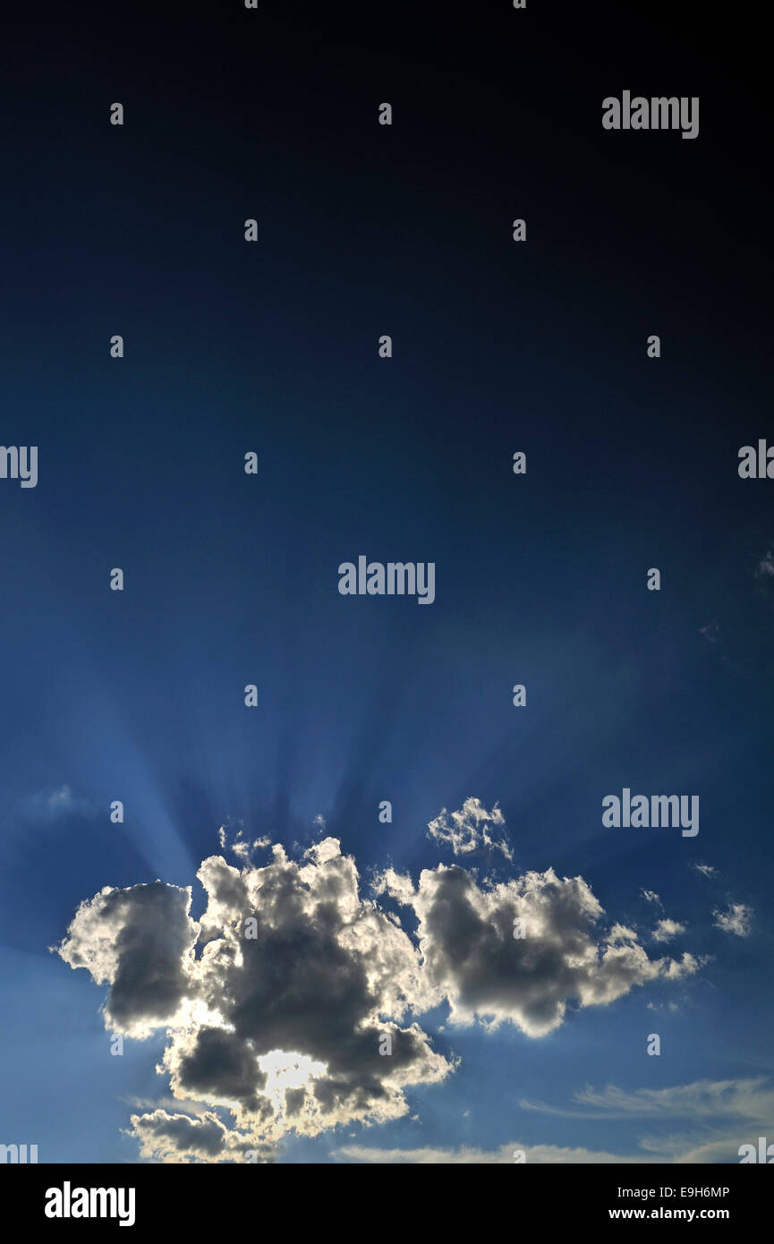 Cloud with sun rays Stock Photo - Alamy