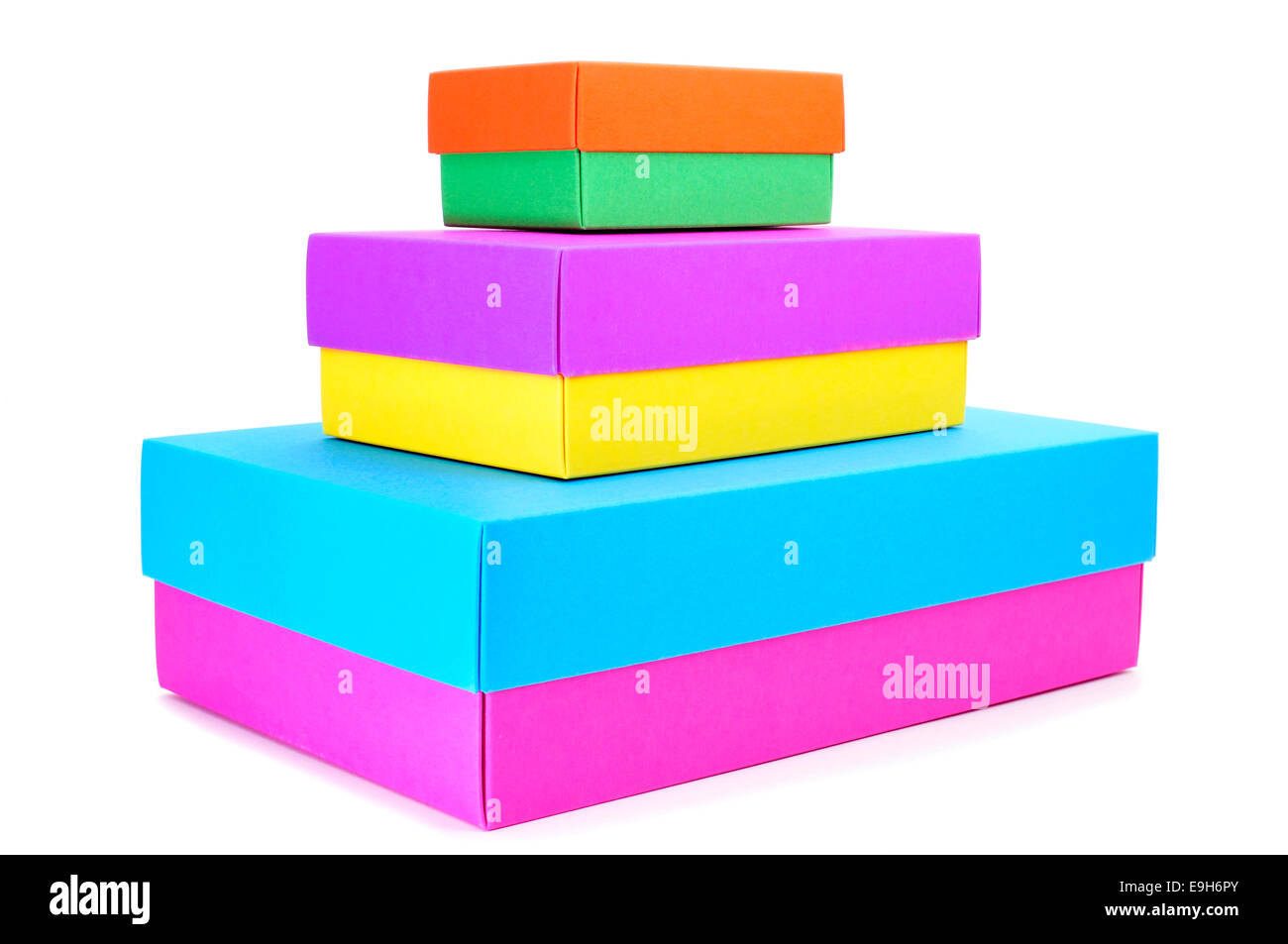 a pile of boxes with different colors on a white background Stock Photo ...