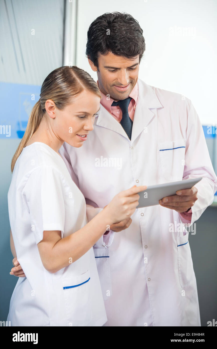 Researcher And Colleague Using Digital Tablet Stock Photo - Alamy