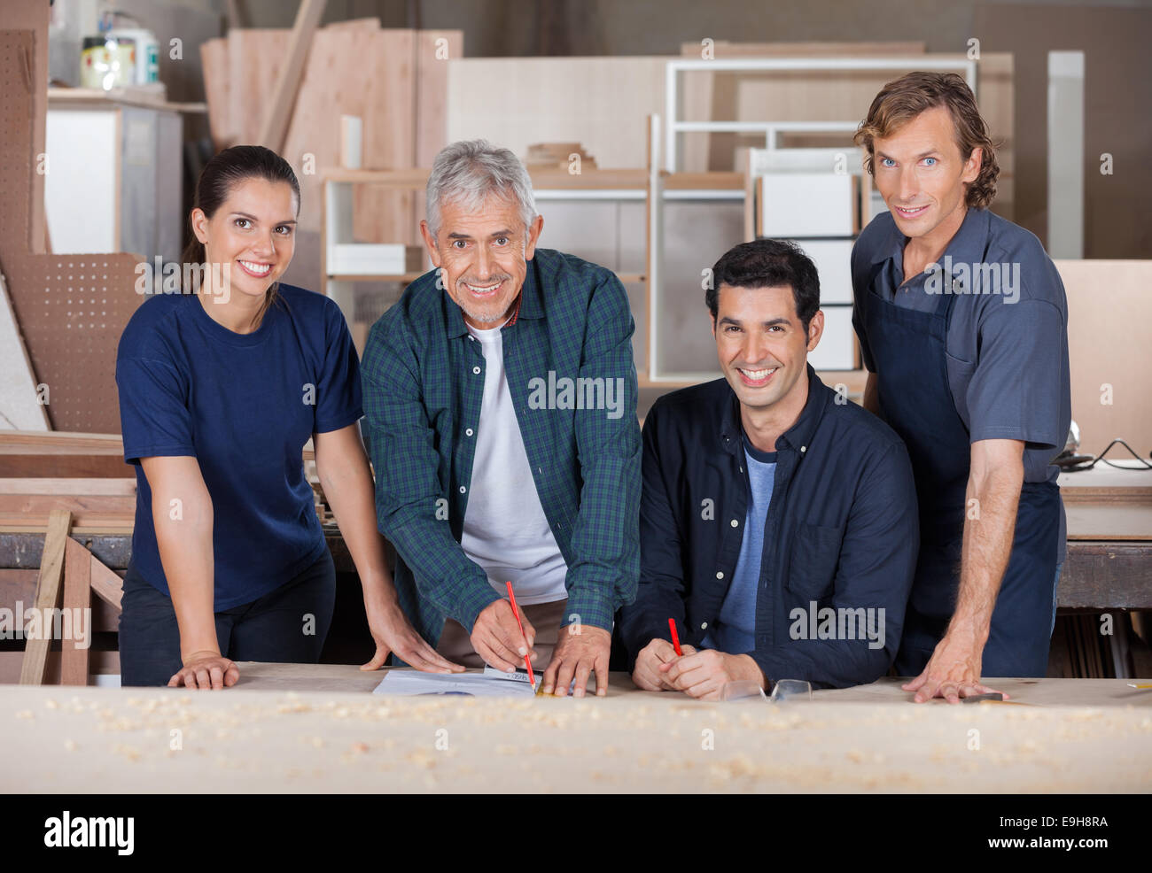 Male female carpenters working in hi-res stock photography and images ...