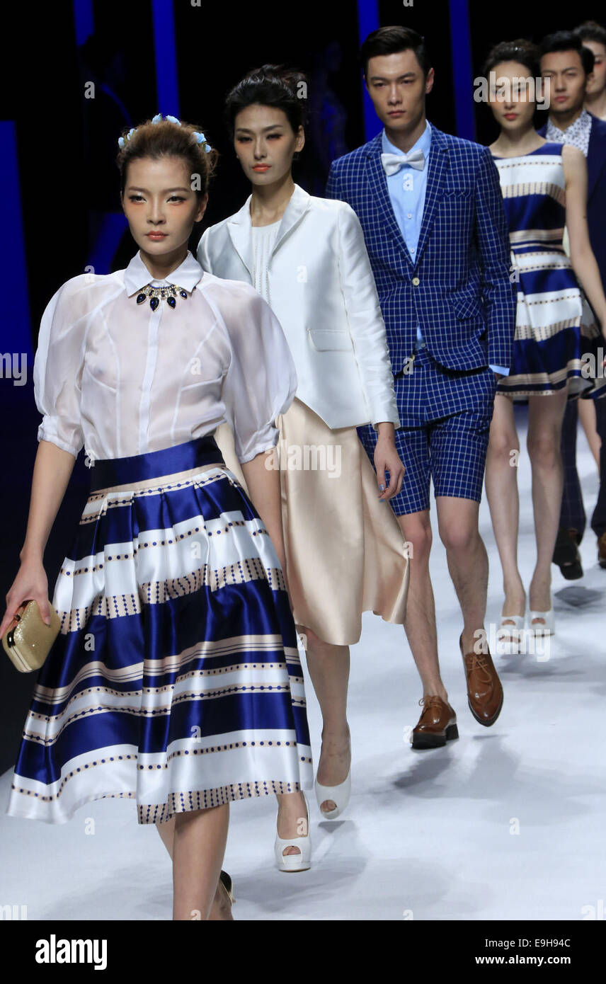 Beijing, China. 28th Oct, 2014. A Models present creations by Chinese ...