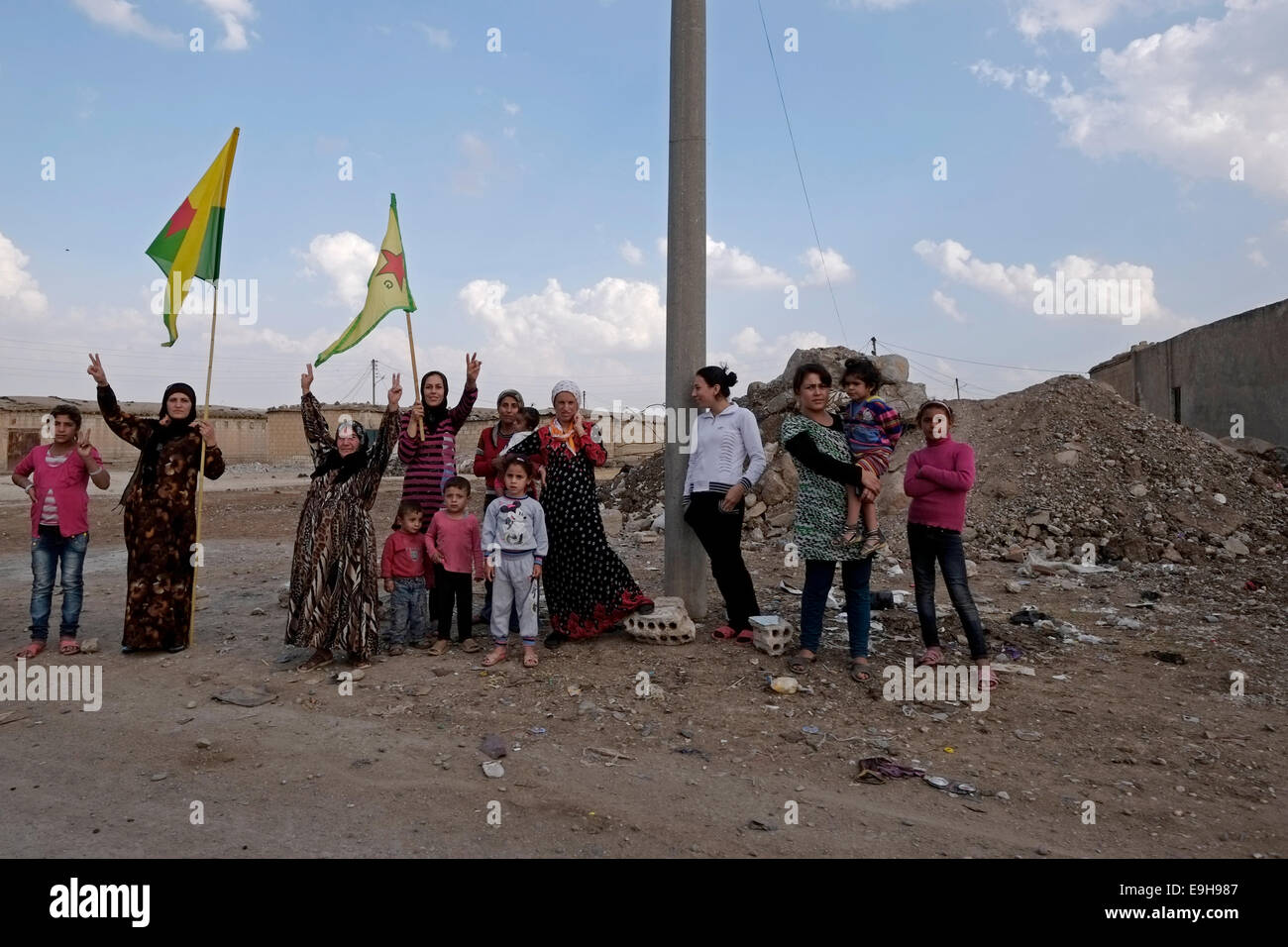 Kurdish women making the victory sign in Al Hasakah or Hassakeh district in Rojava the de facto ...