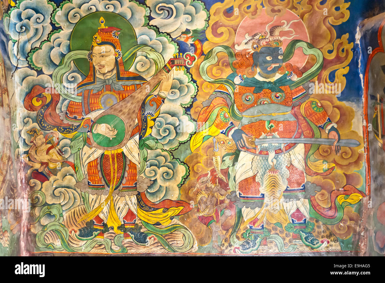 Musicians and demon mural at the entrance of the Tashi Choling Gompa ...