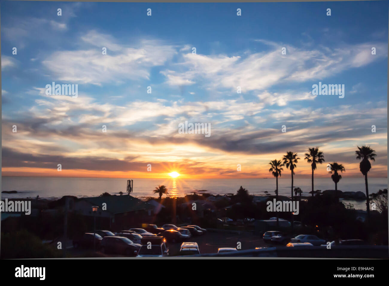 Car parking under a dramatic sunset Stock Photo - Alamy