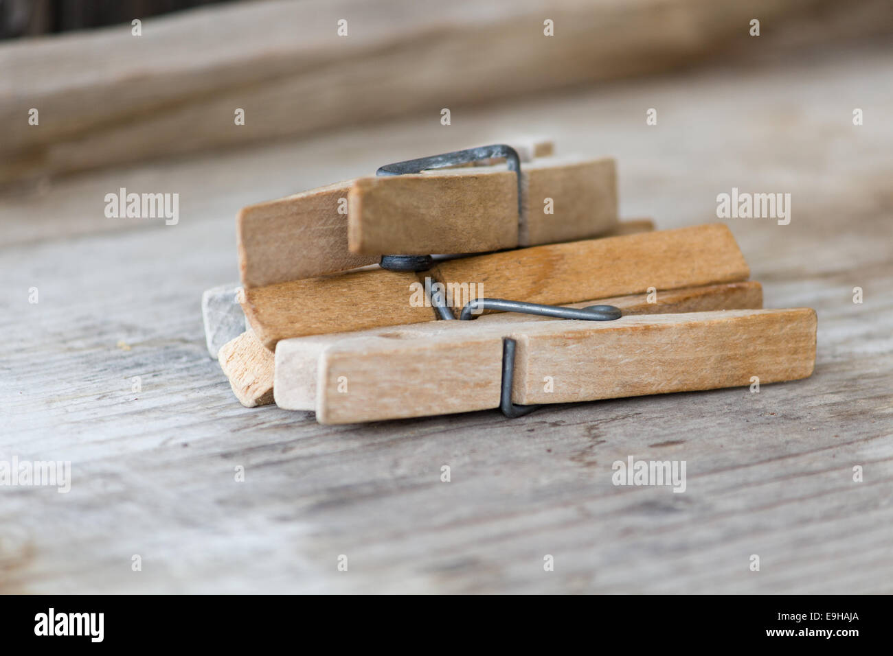 Four wooden clothespins hi-res stock photography and images - Alamy