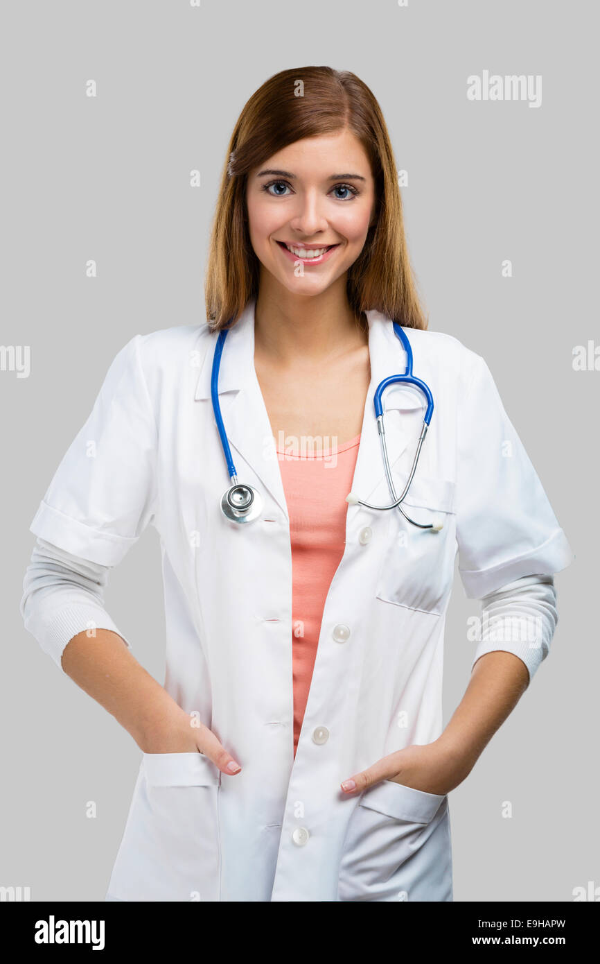 Beautiful And Attractive Female Doctor Isolated Over A White