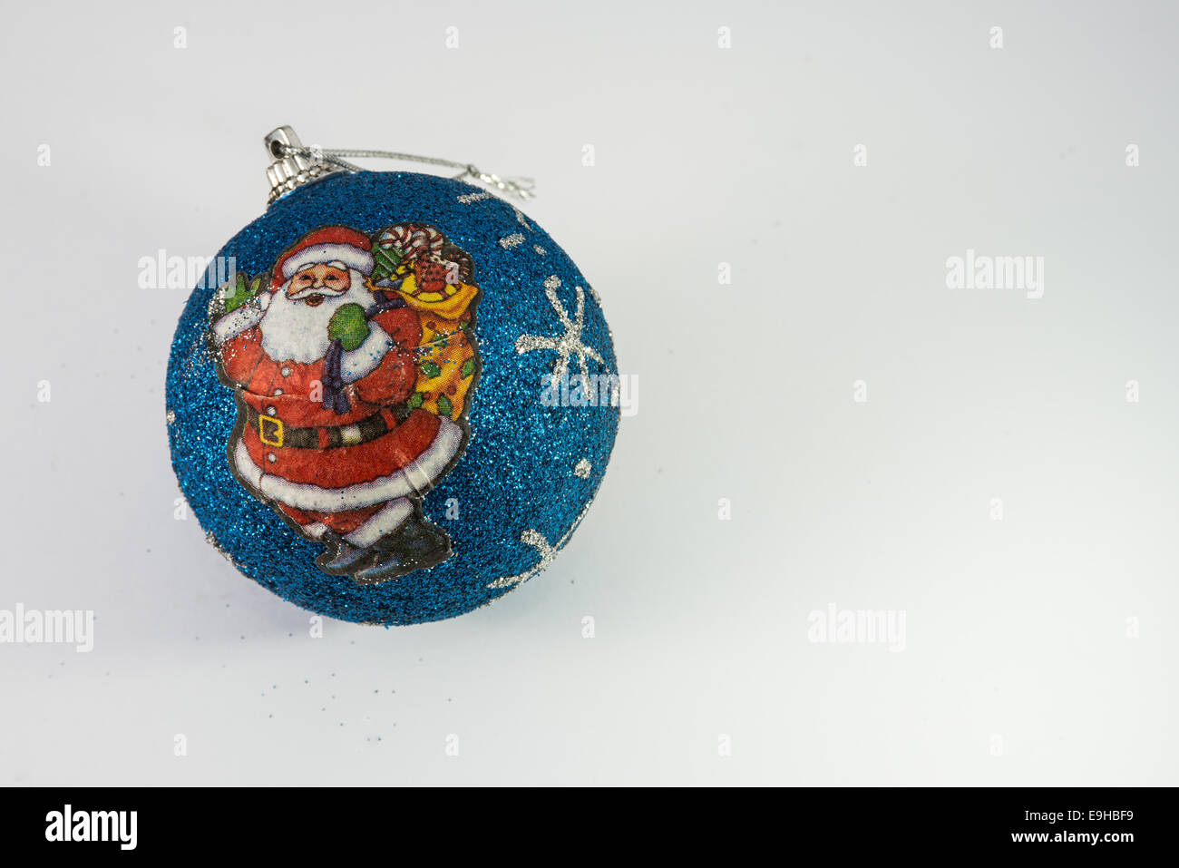 Blue ball with santa claus on it Stock Photo - Alamy
