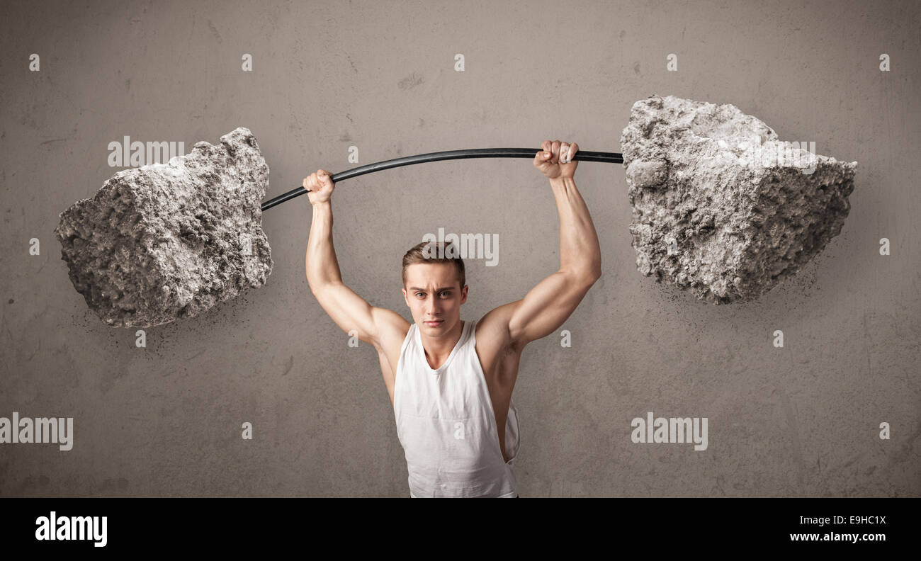muscular man lifting large rock stone weights Stock Photo - Alamy