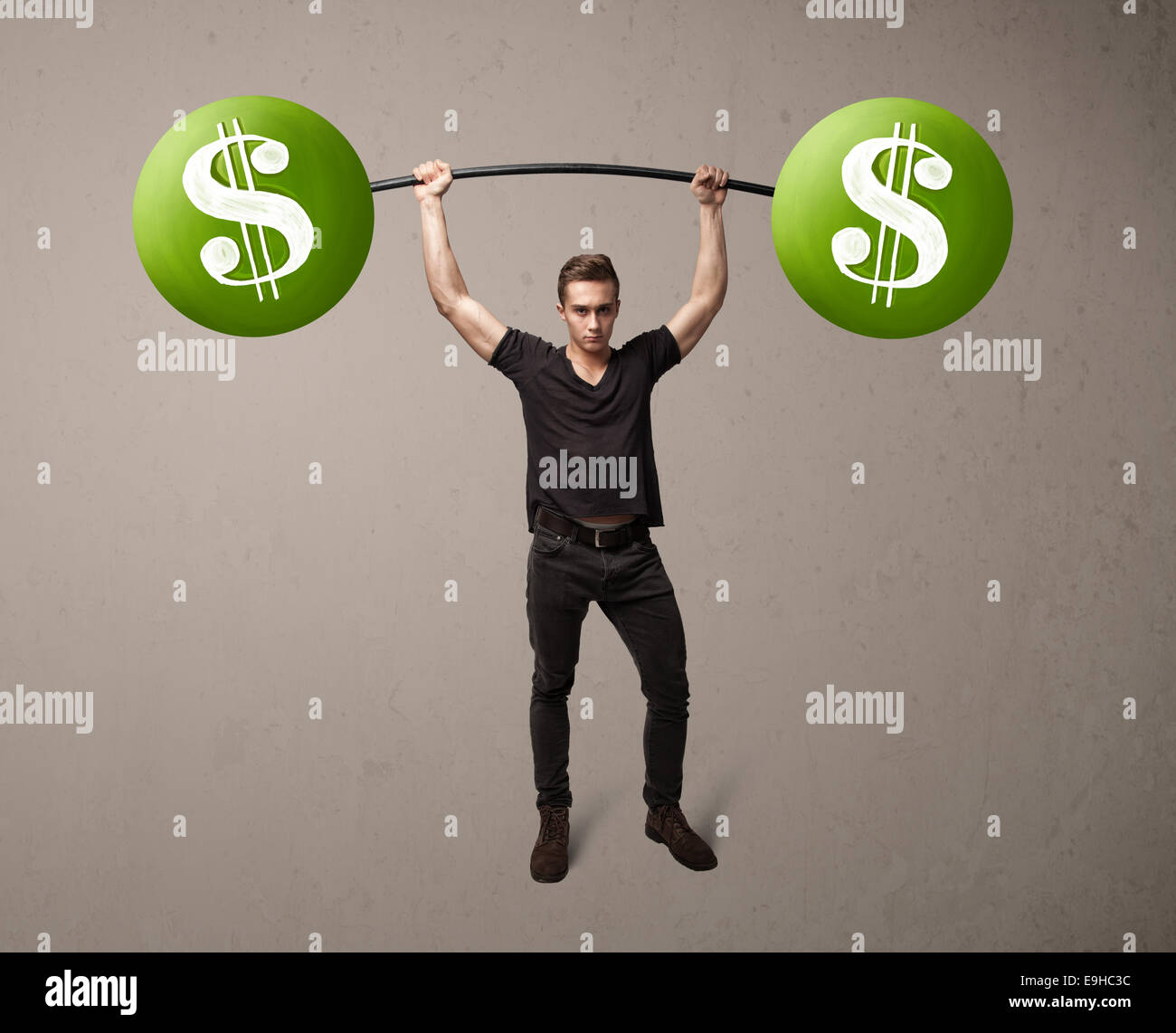 muscular man lifting green dollar sign weights Stock Photo - Alamy