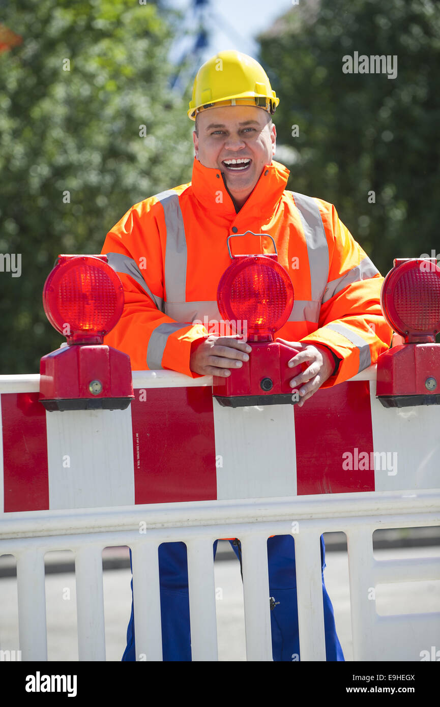 Workers checked the Construction Barrier Stock Photo - Alamy
