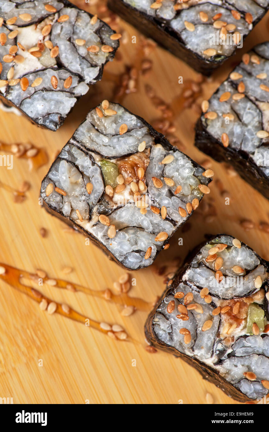 sesame sushi rolls Stock Photo - Alamy