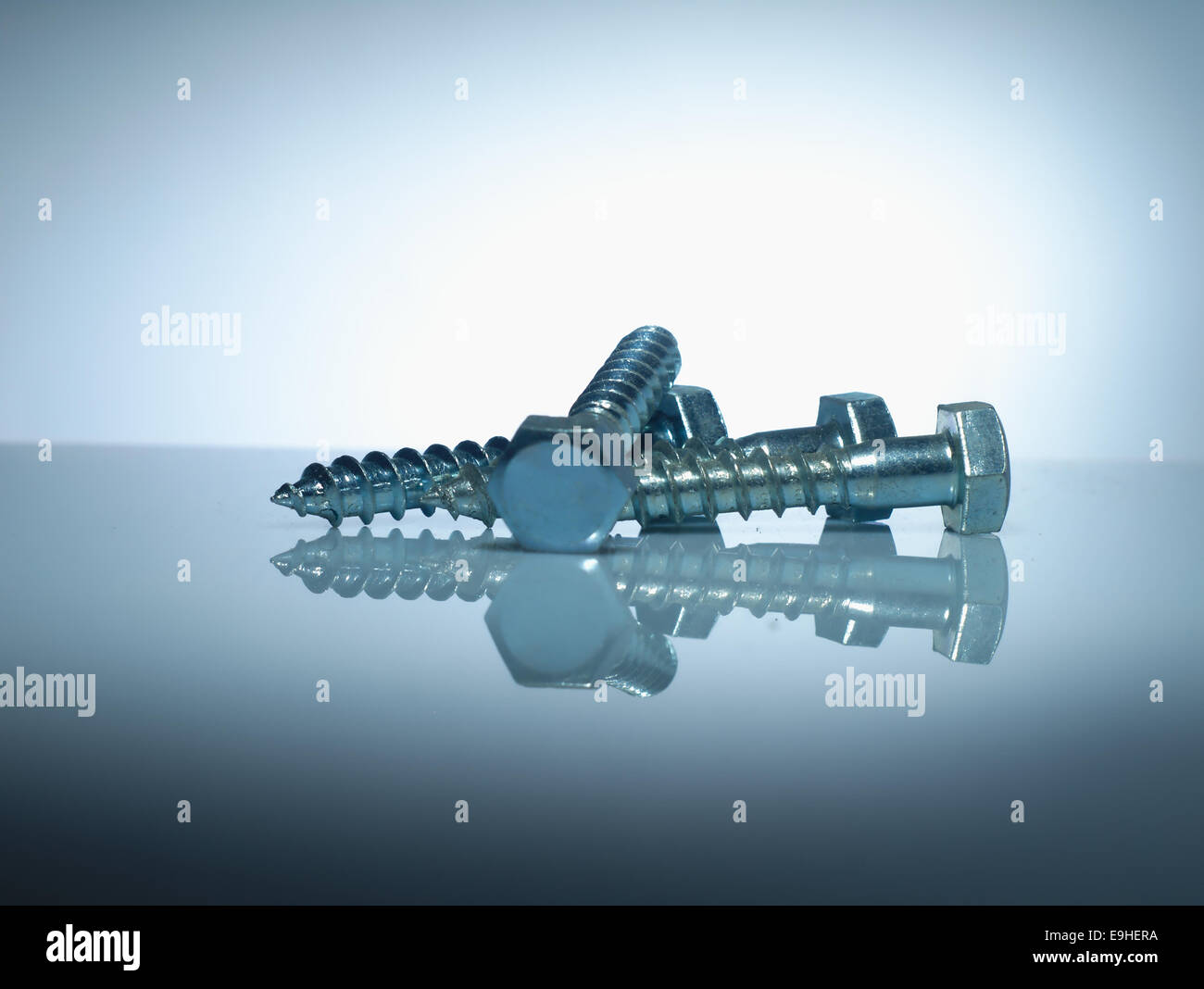 Silver screws as seen from up close Stock Photo - Alamy