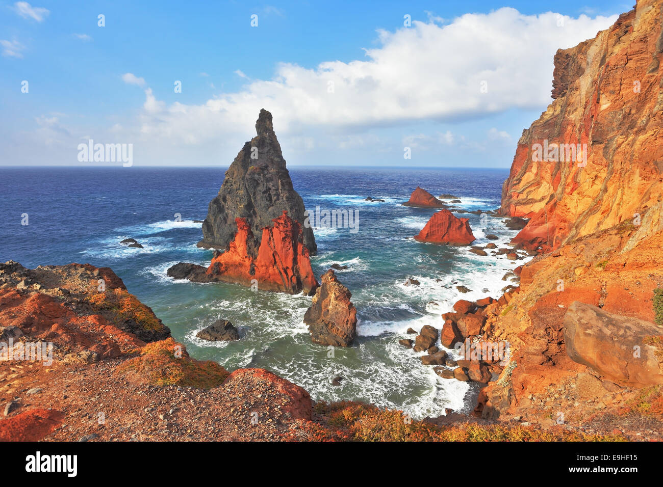 Picturesque colorful cliffs and islands Stock Photo - Alamy